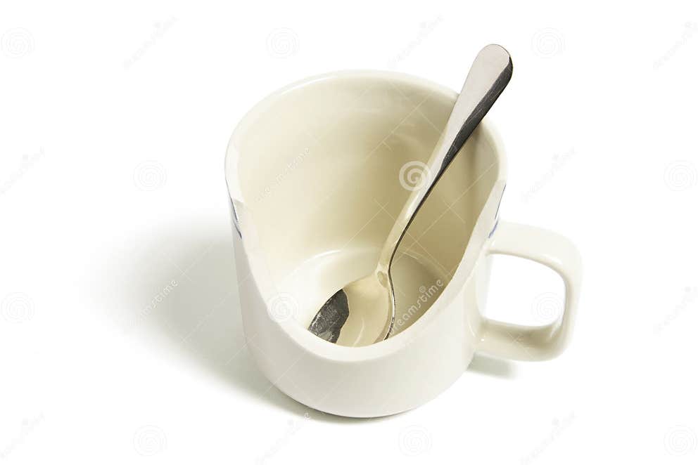 Spoon in Broken Mug stock photo. Image of damage, ceramic - 11153572