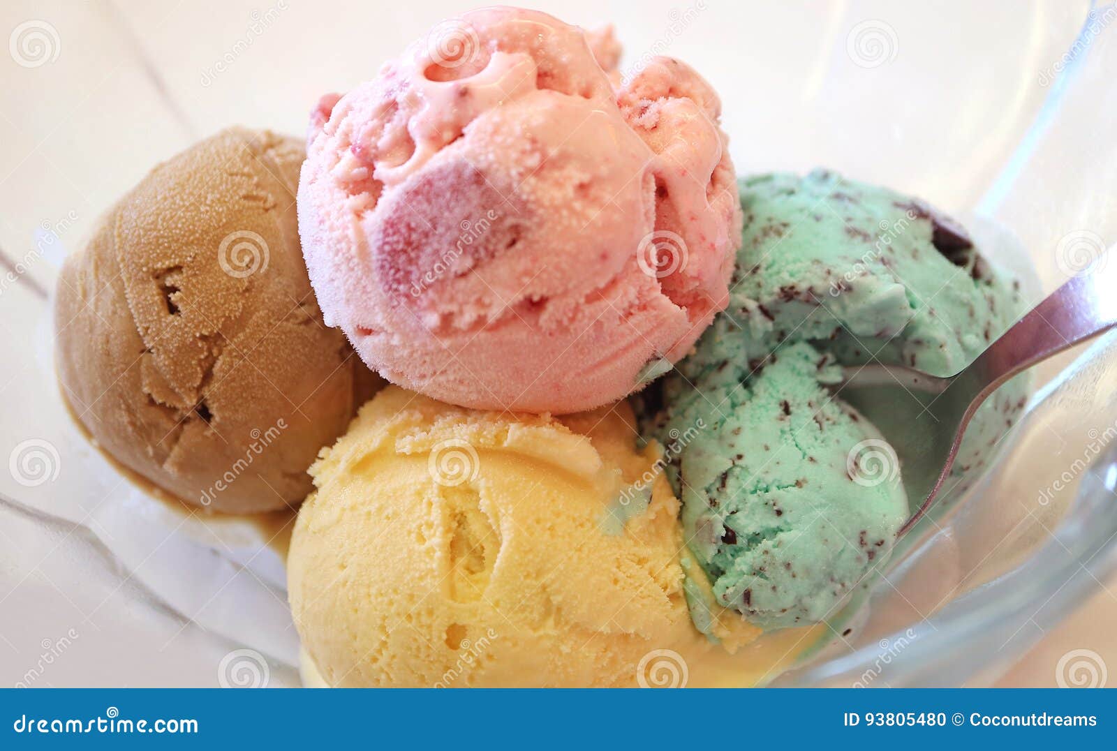 Spoon Digging In Mint Chocolate Chip Ice Cream Four Scoops Of Ice