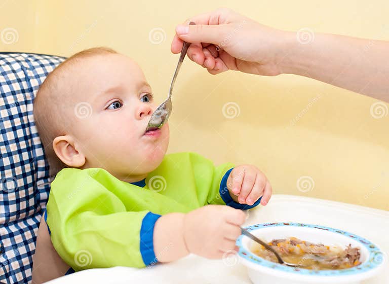 Spoon Feeding stock photo. Image of childhood, offspring - 11765556