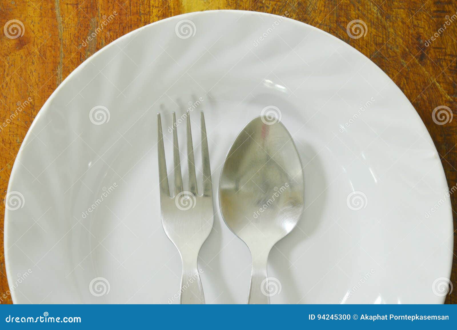 Spoon and Fork Arranging on Dish Stock Photo - Image of food, stainless ...