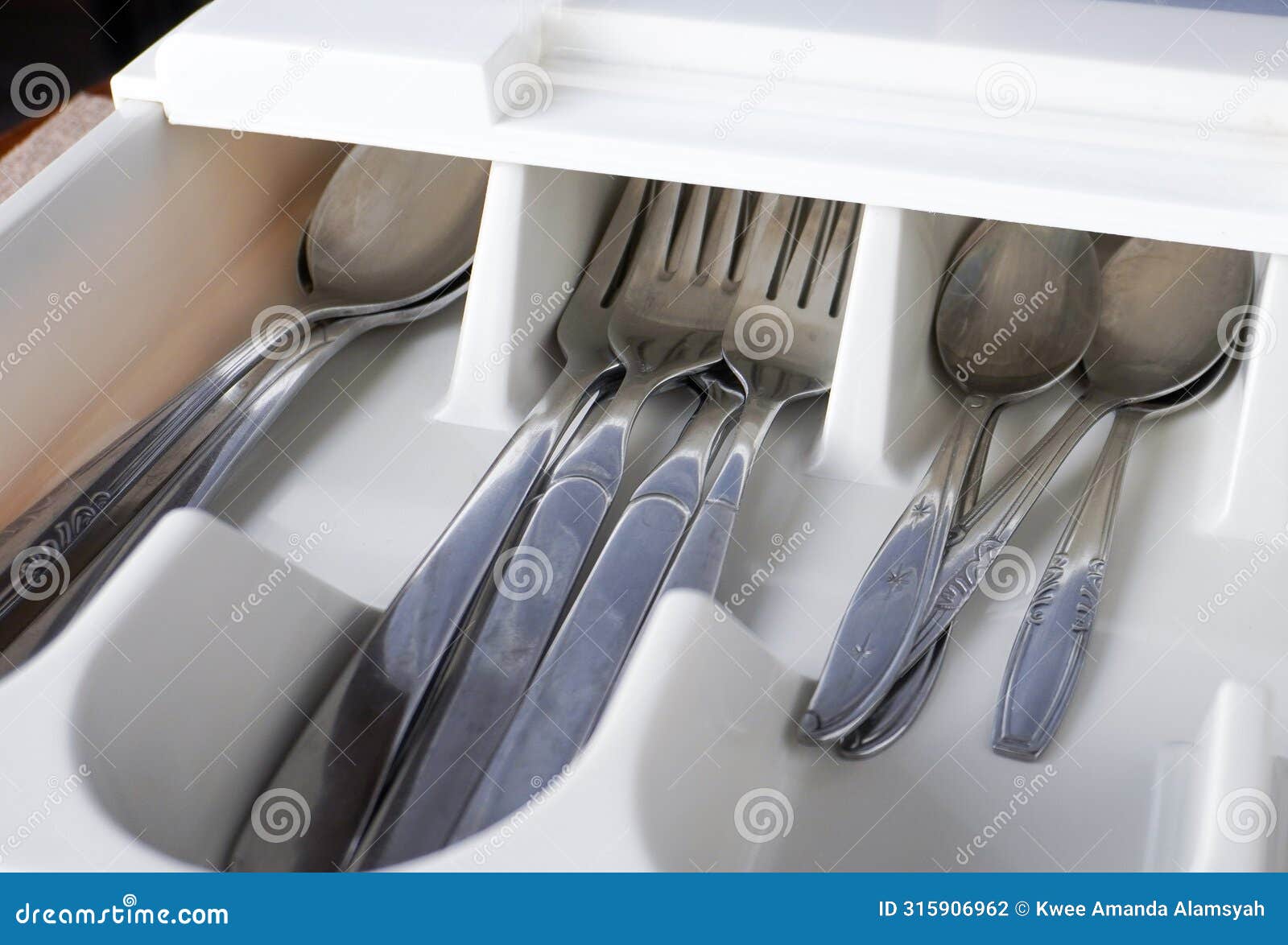 Spoon and Fork Eating Ware in Sectioned Box Stock Photo - Image of ...