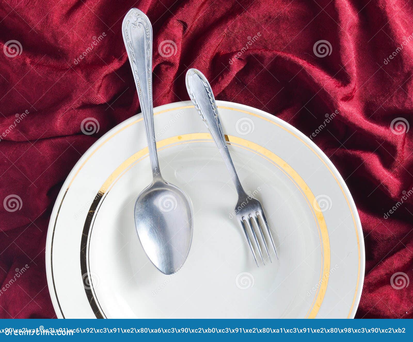 Spoon, Fork, Plate on a Red Silk Tablecloth. Romantic Dinner Stock ...