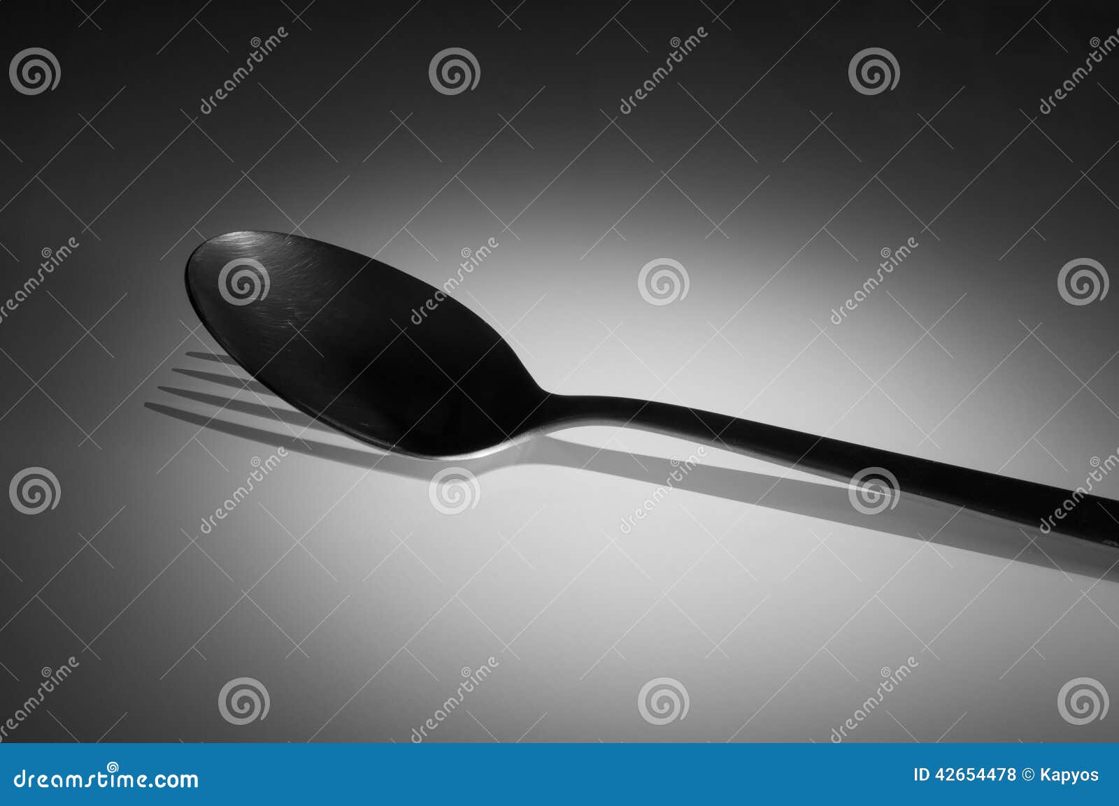 Spoon with a fork shadow stock photo. Image of white - 42654478