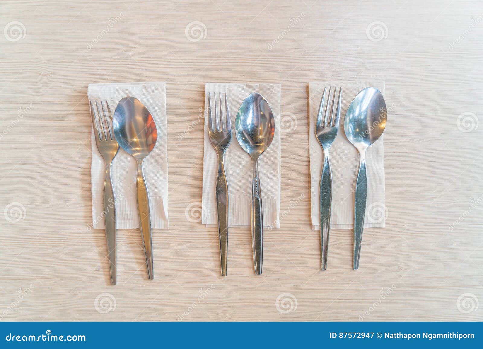 Spoon and fork on table stock image. Image of napkin - 87572947
