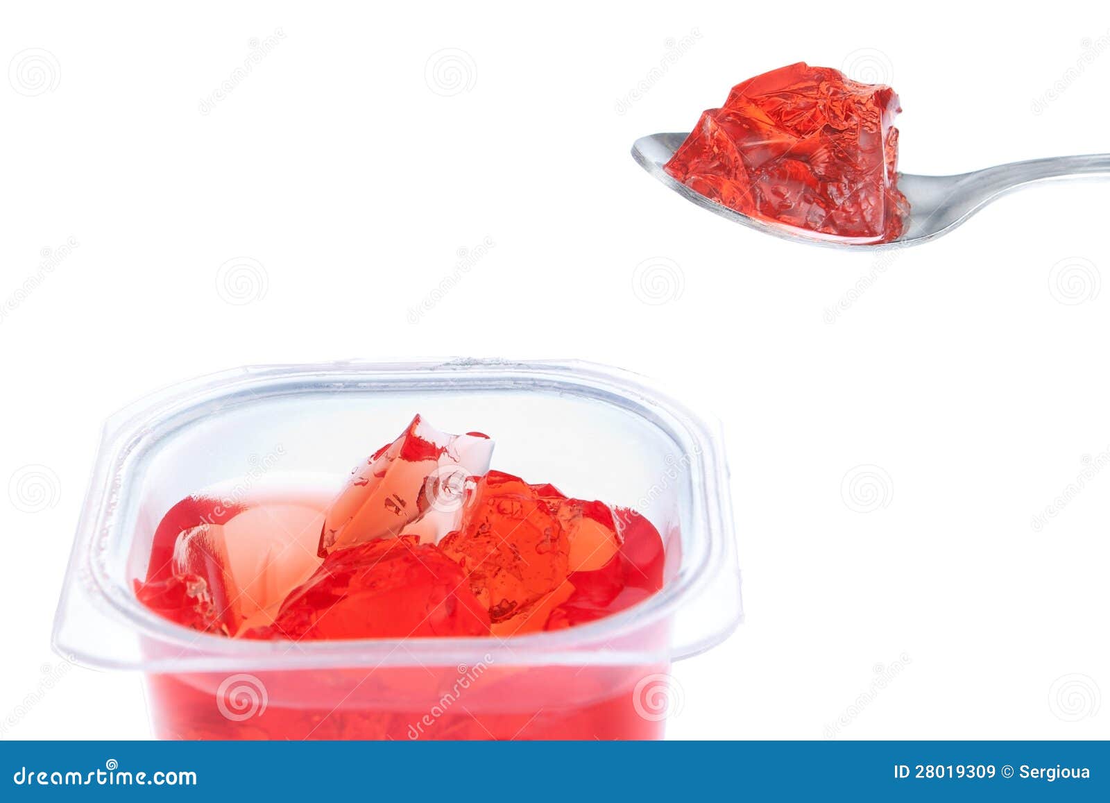 Spoon full of red gelatin. stock image. Image of bright - 28019309