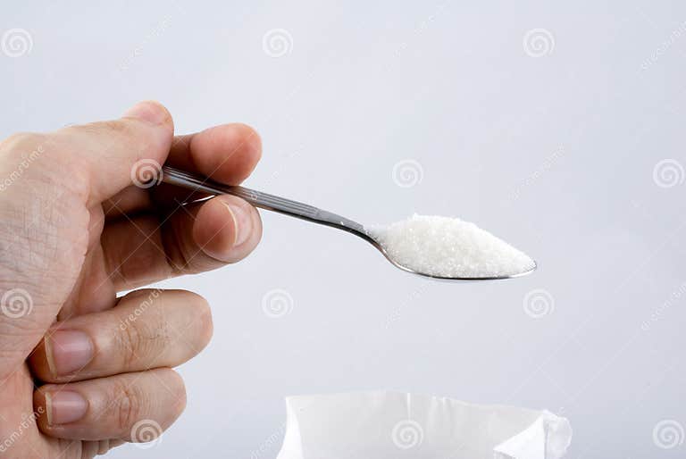 Spoon Full of Sugar Hand Hold Stock Photo - Image of diet, grains: 2090016