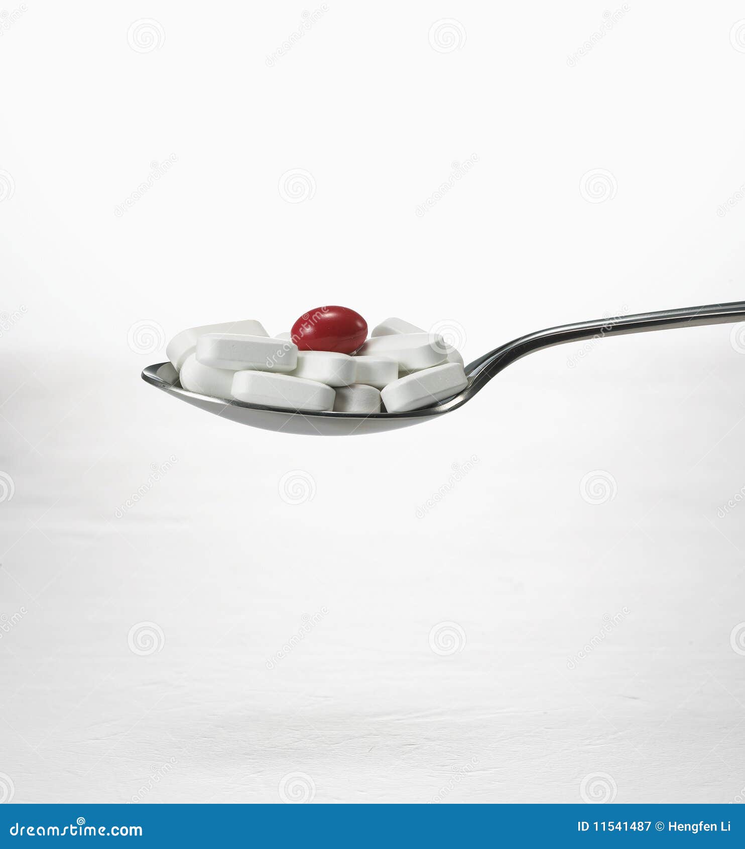 Spoon full of tablets stock image. Image of medicine - 11541487