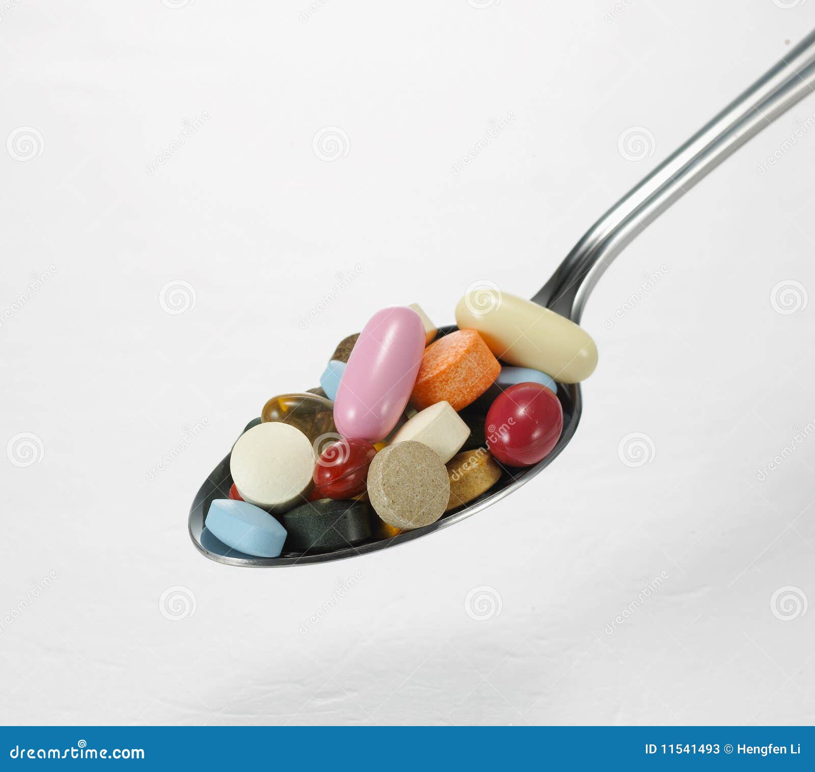 Spoon full of tablets stock image. Image of industry - 11541493