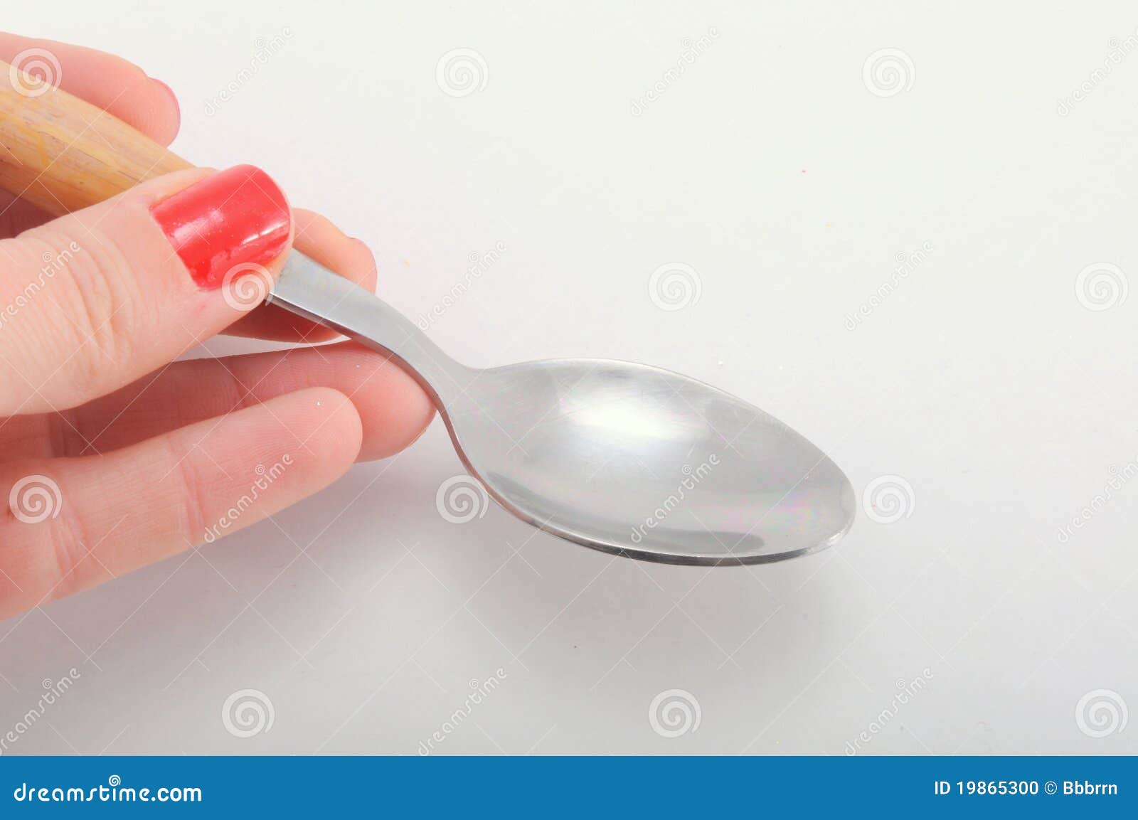 Spoon on hand stock photo. Image of holding, grip, hold - 19865300