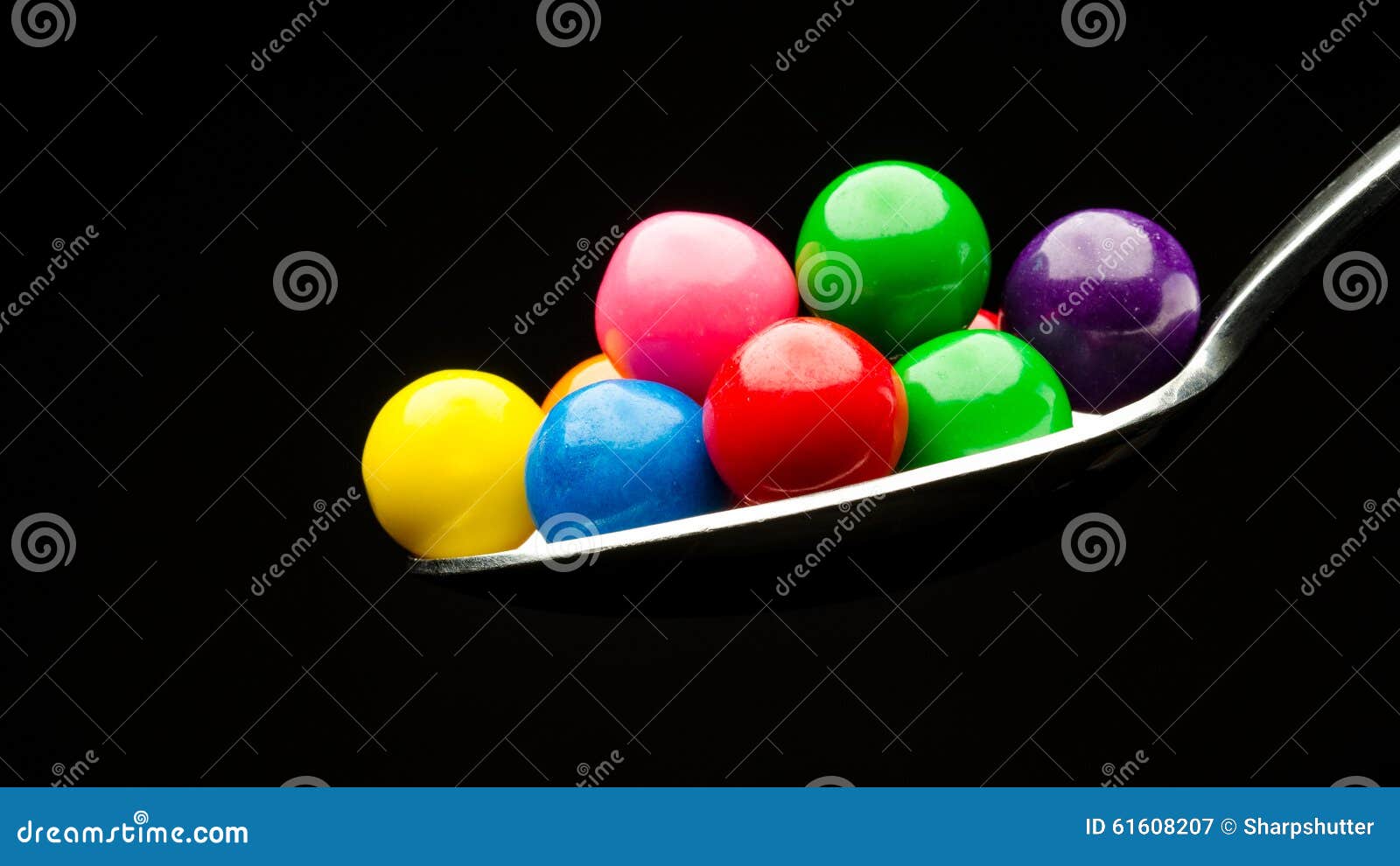 Spoon Holding Many Gumballs Stock Image - Image of crunchy, micro: 61608207
