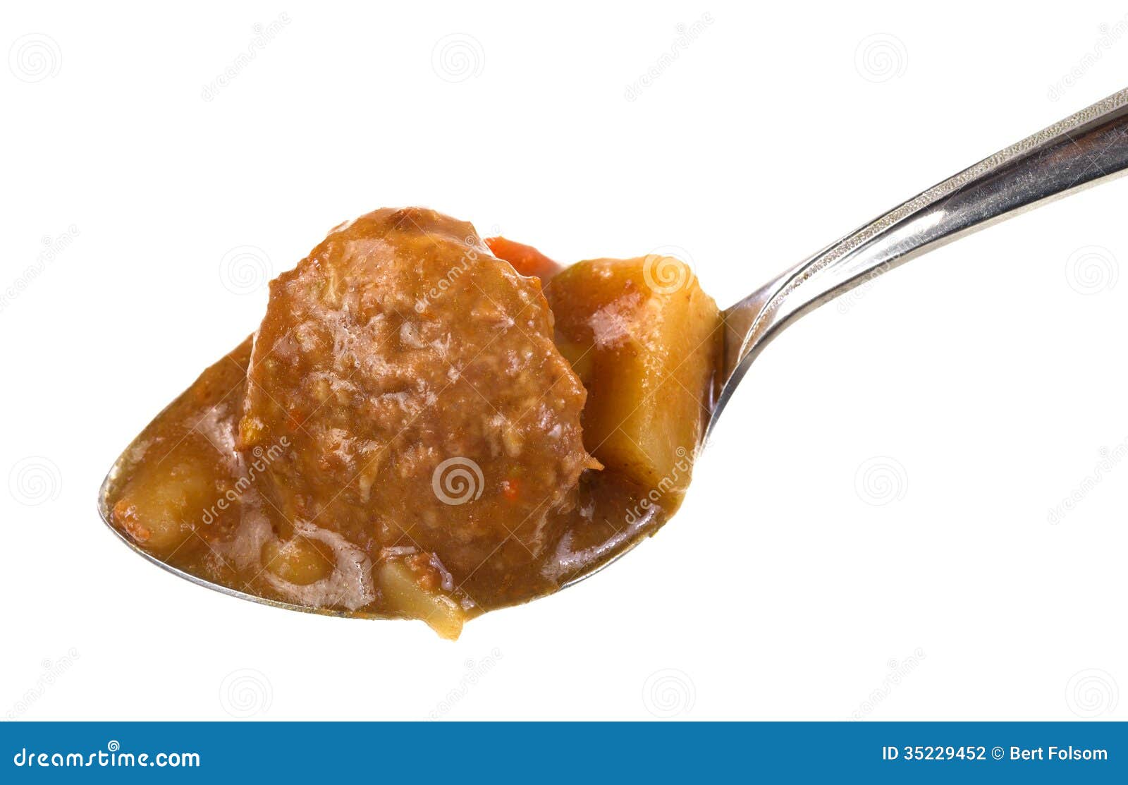 Spoon with a Meatball and Vegetables Stock Photo - Image of liquid ...