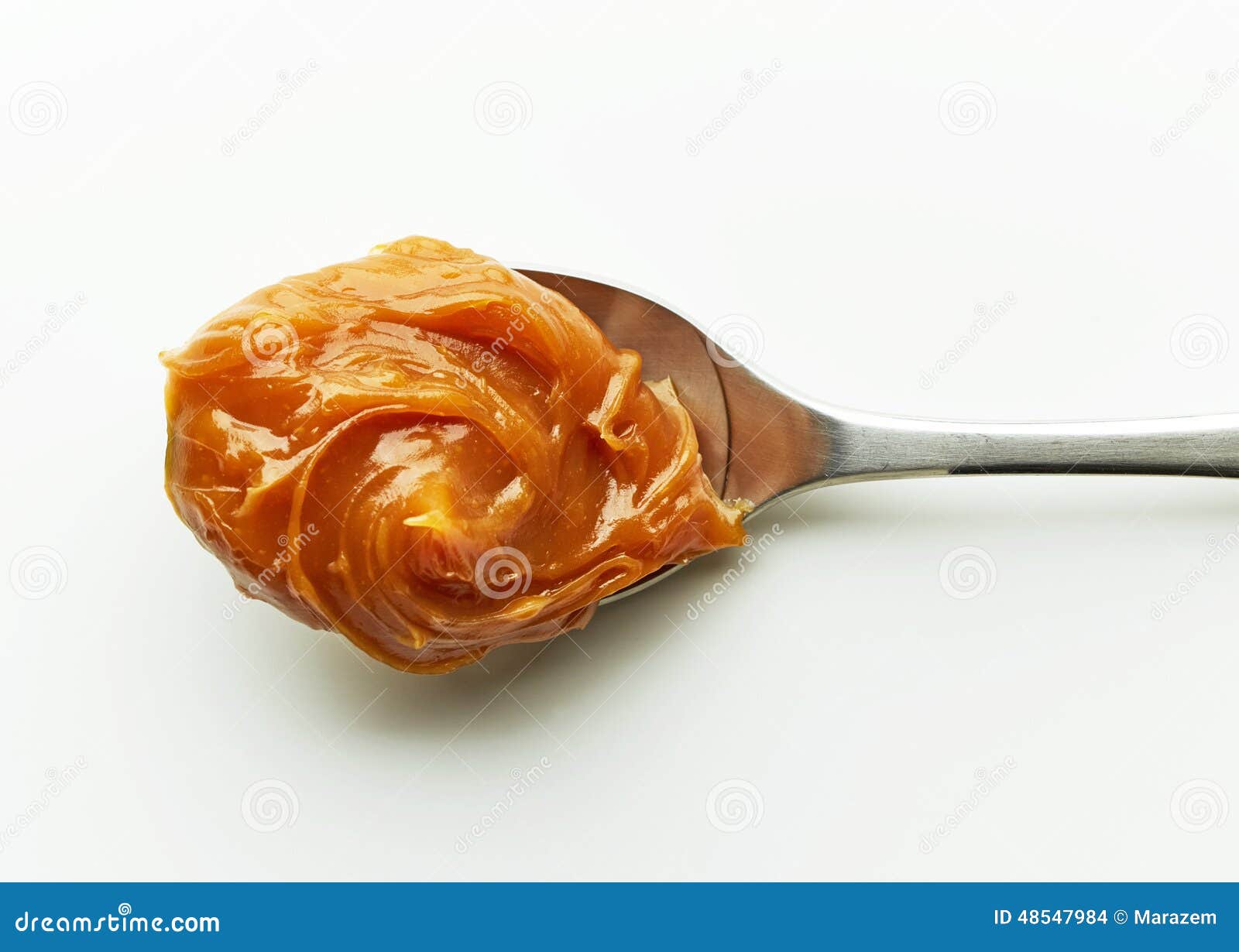 Spoon of Melted Caramel Cream Stock Photo - Image of candy, cooking ...