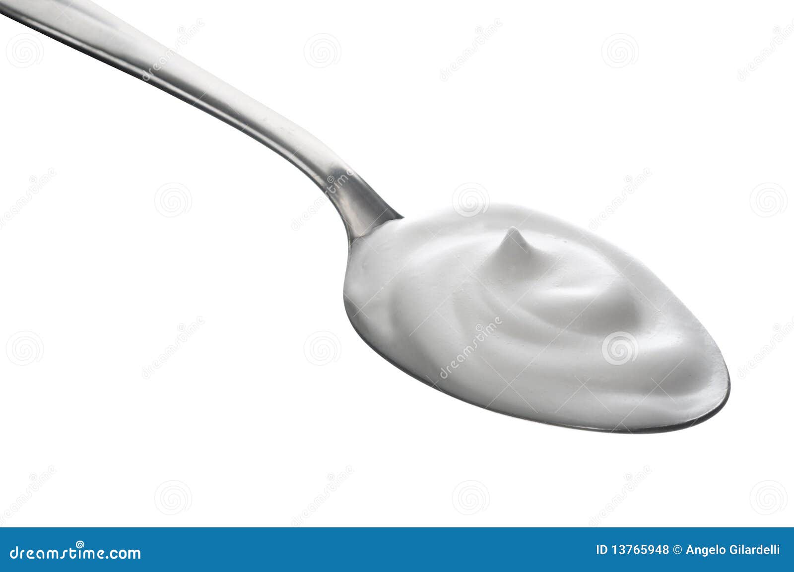 Spoon of milk cream stock photo. Image of yogurt, cream - 13765948