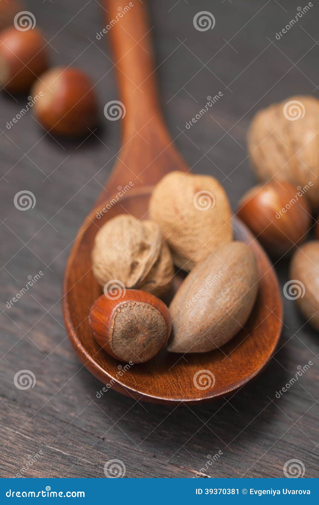 Spoon with Nuts on a Wooden Surface Stock Image - Image of nutrition ...