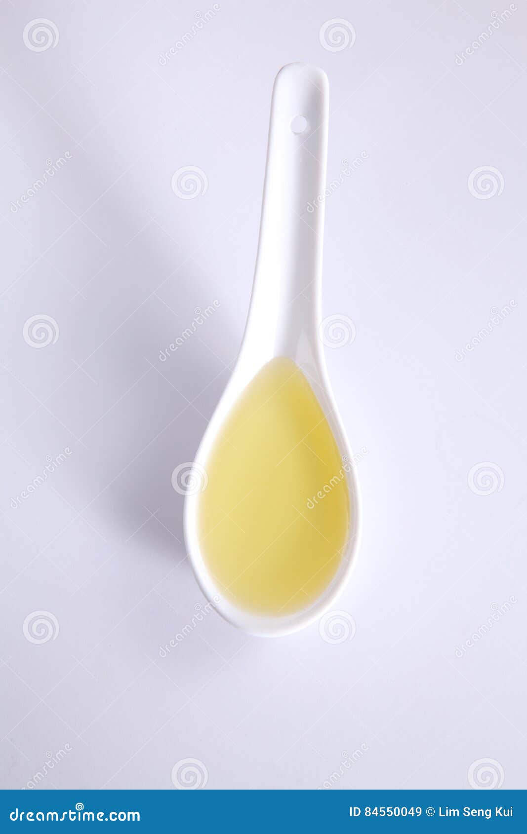 Spoon of oil stock image. Image of tablespoon, cooking - 84550049