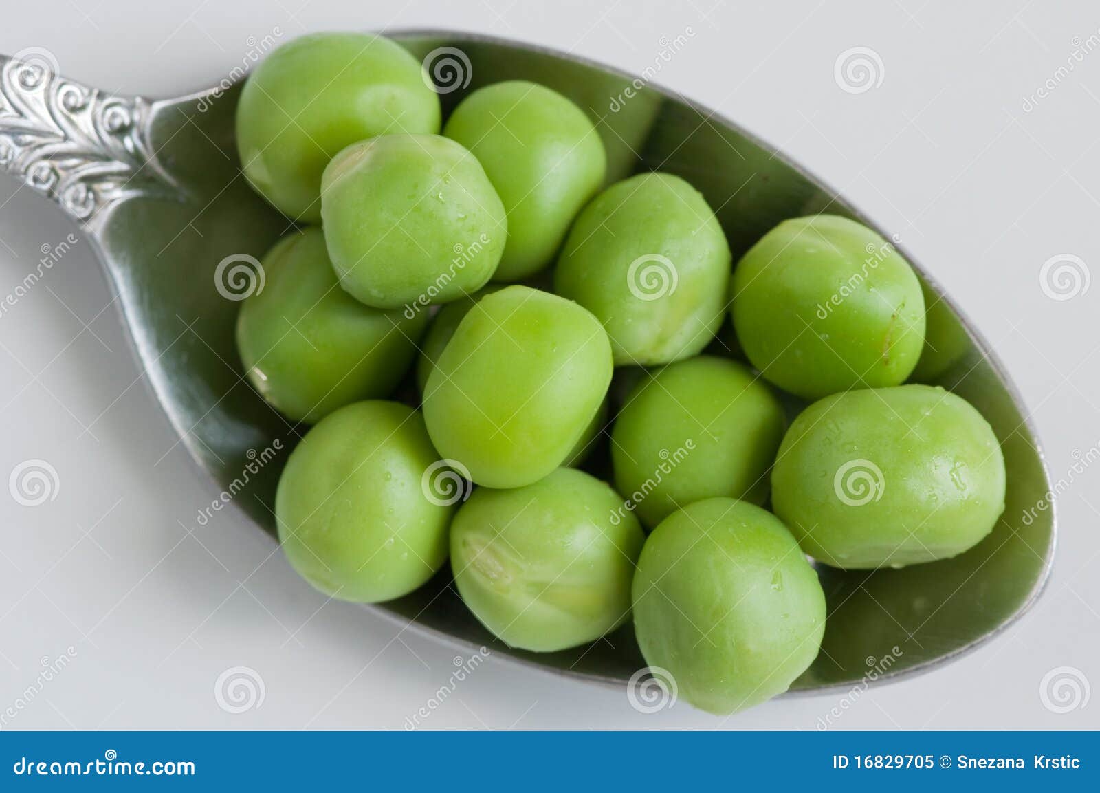 Spoon with peas stock image. Image of closeup, green - 16829705