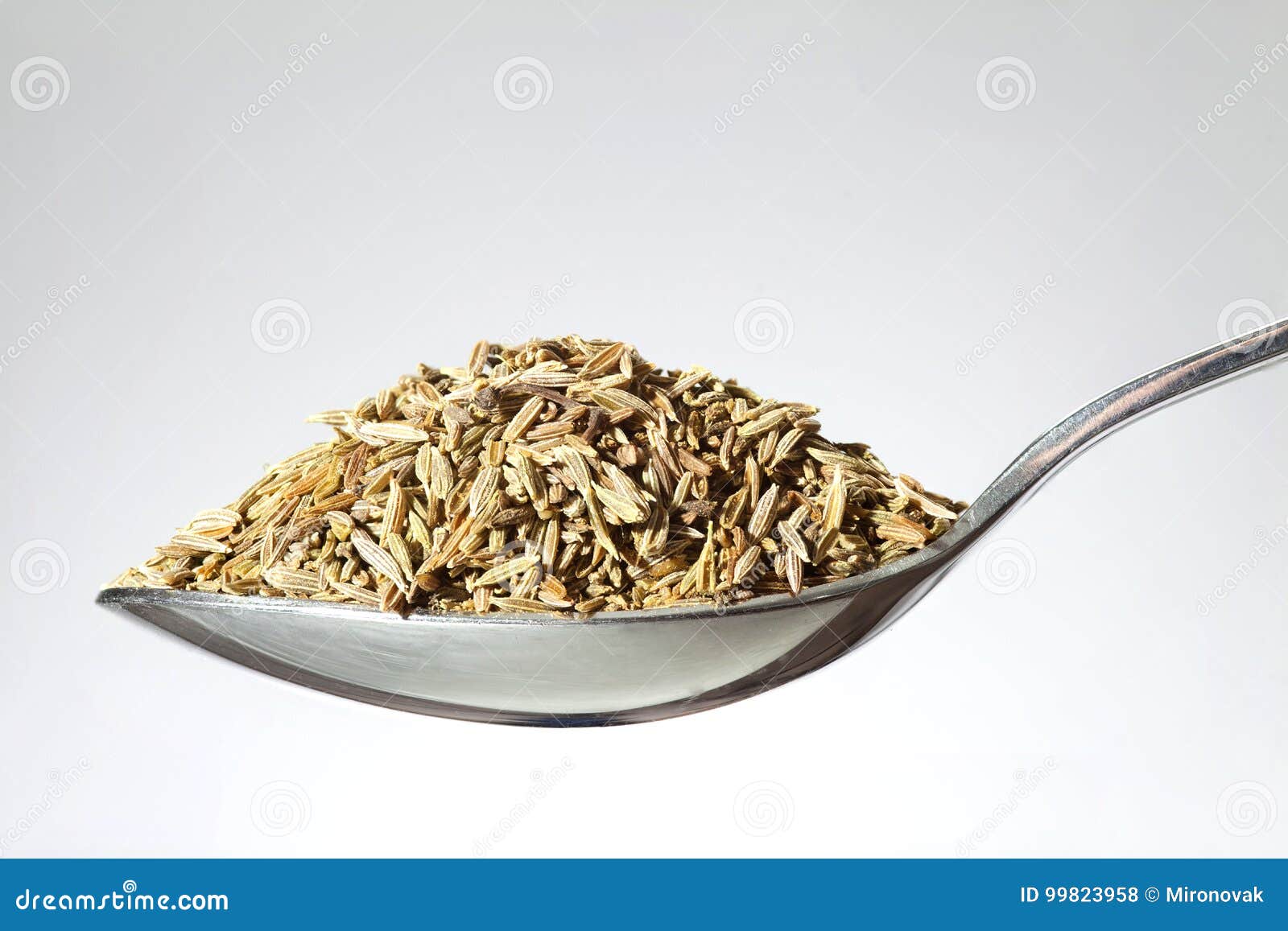 Spoon with Pile of Cumin Grain Stock Photo - Image of background ...