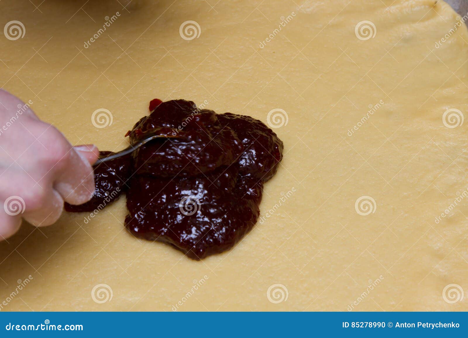 Spoon smear jam on pastry stock photo. Image of craneberries - 85278990