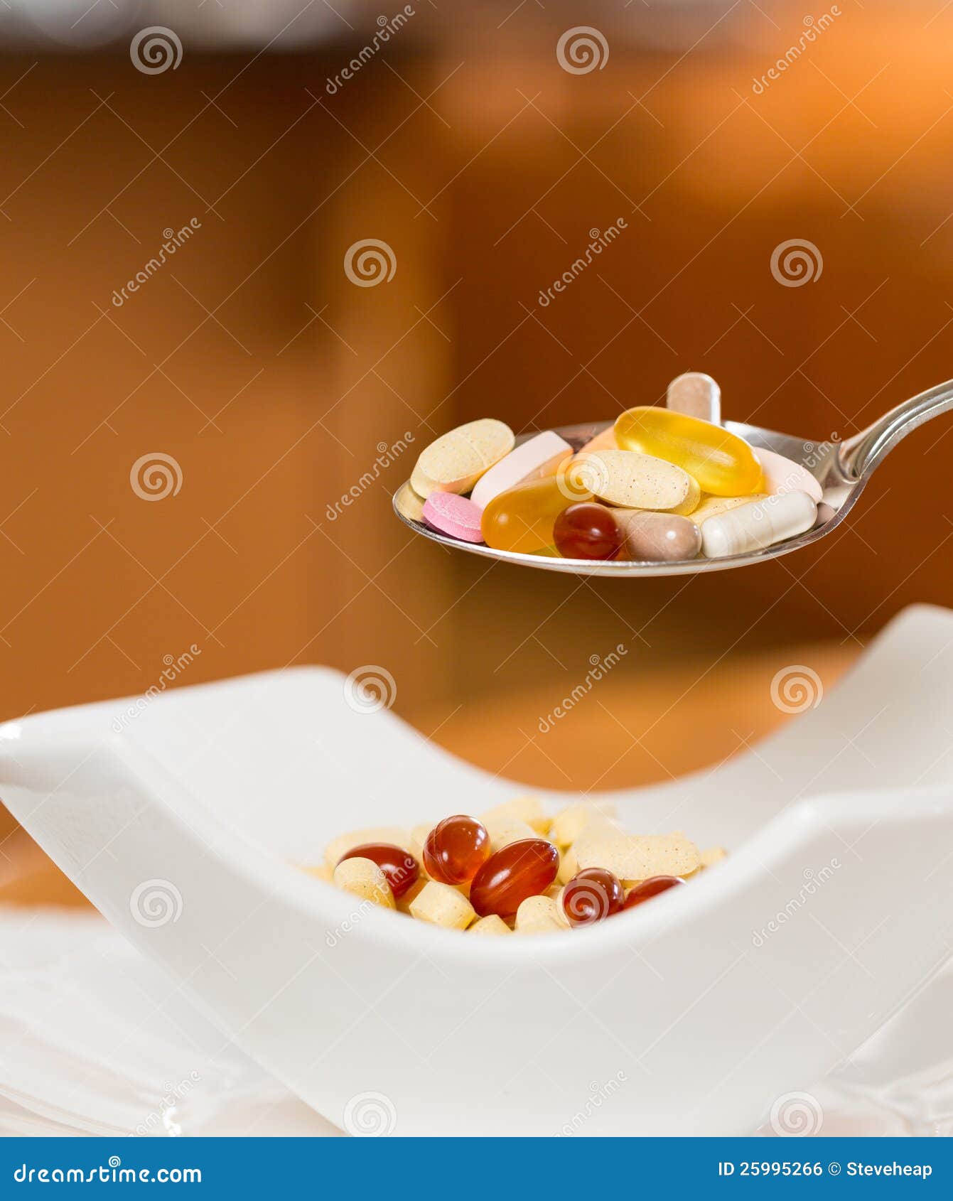 Spoon of Vitamins Over Bowl of Tablets Stock Photo - Image of cheerful ...