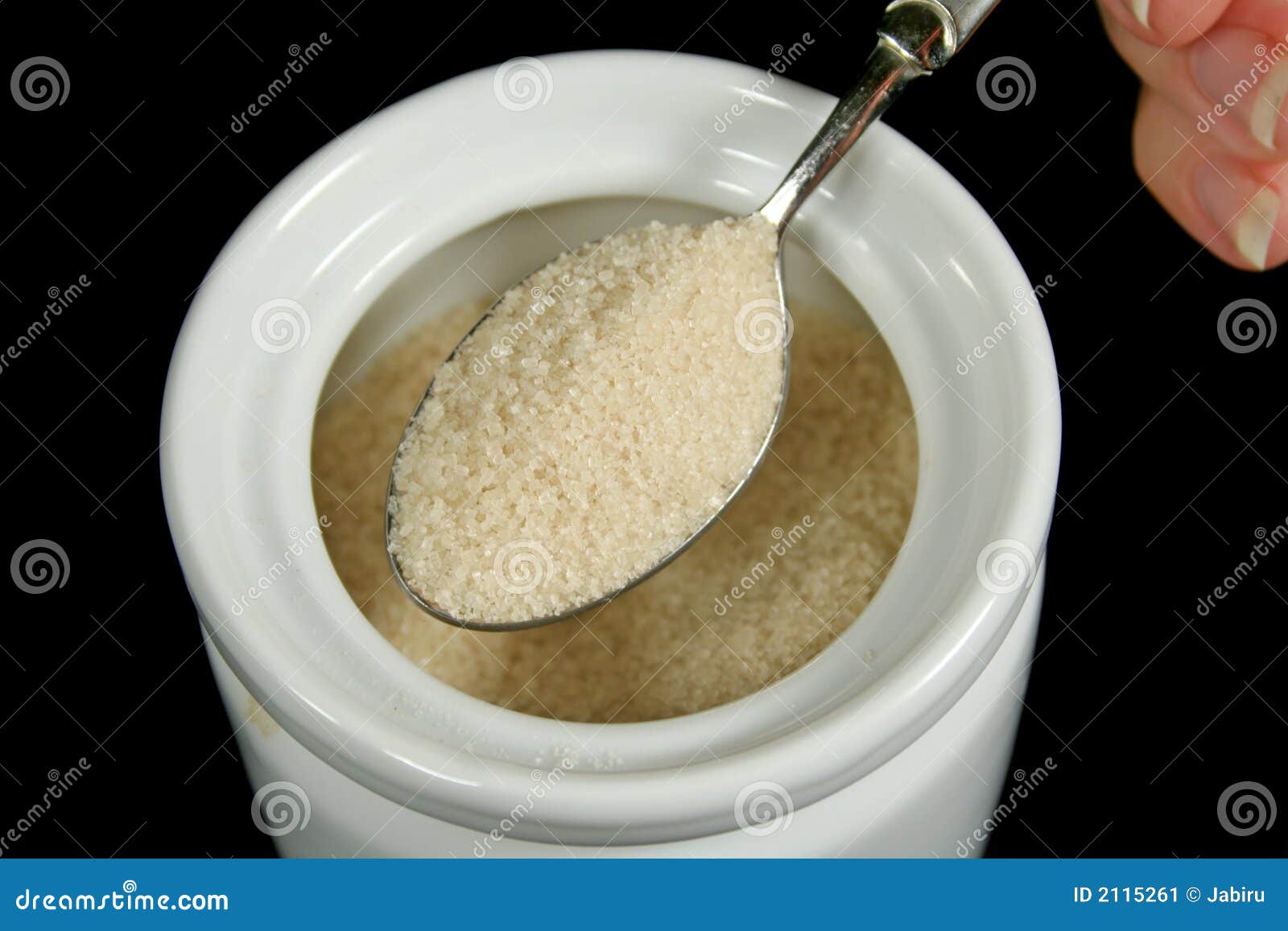 Spoonful of Sugar stock image. Image of bowl, hand, bowls - 2115261