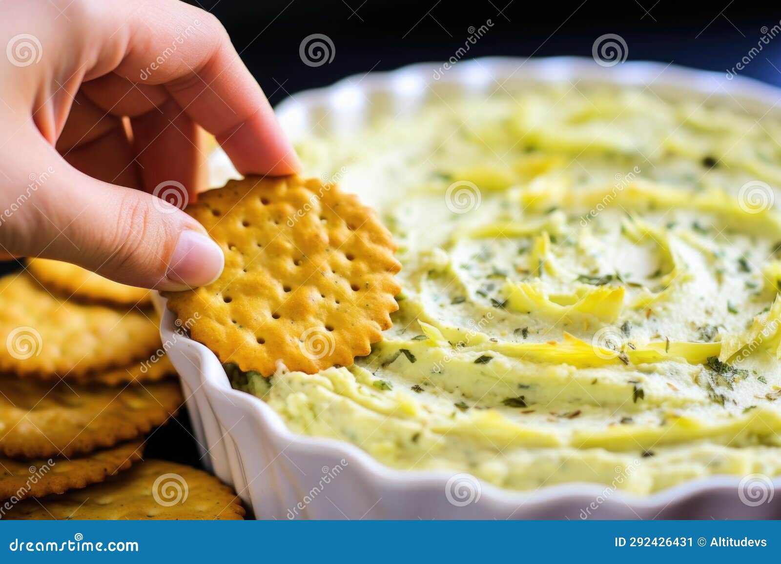 Spooning Artichoke Heart Dip Onto a Cracker Stock Image - Image of ...