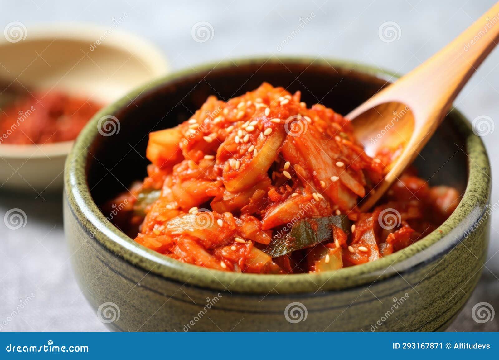 Spooning Spicy Red Kimchi Onto Plain Rice Bowl Stock Image - Image of ...