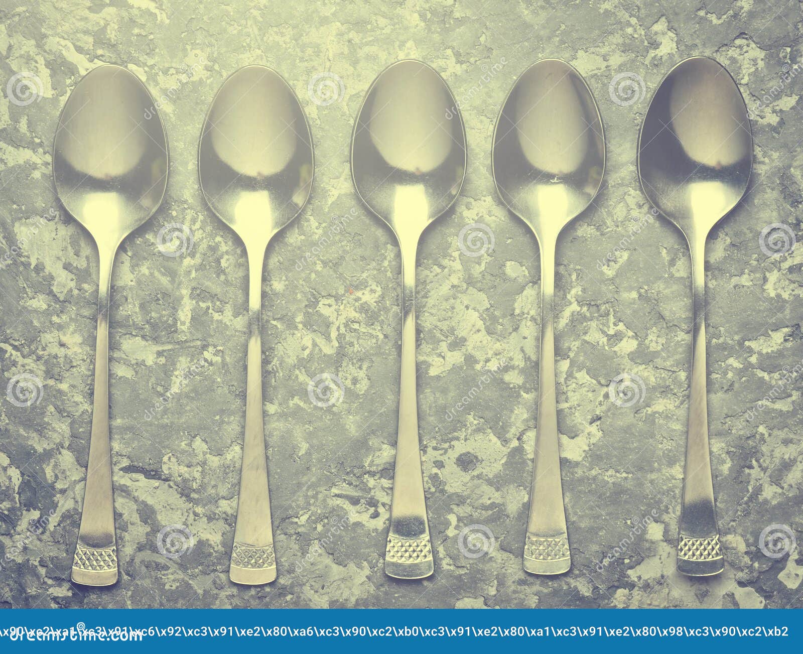 Spoons on Concrete Background. Stock Image - Image of spoons, view ...