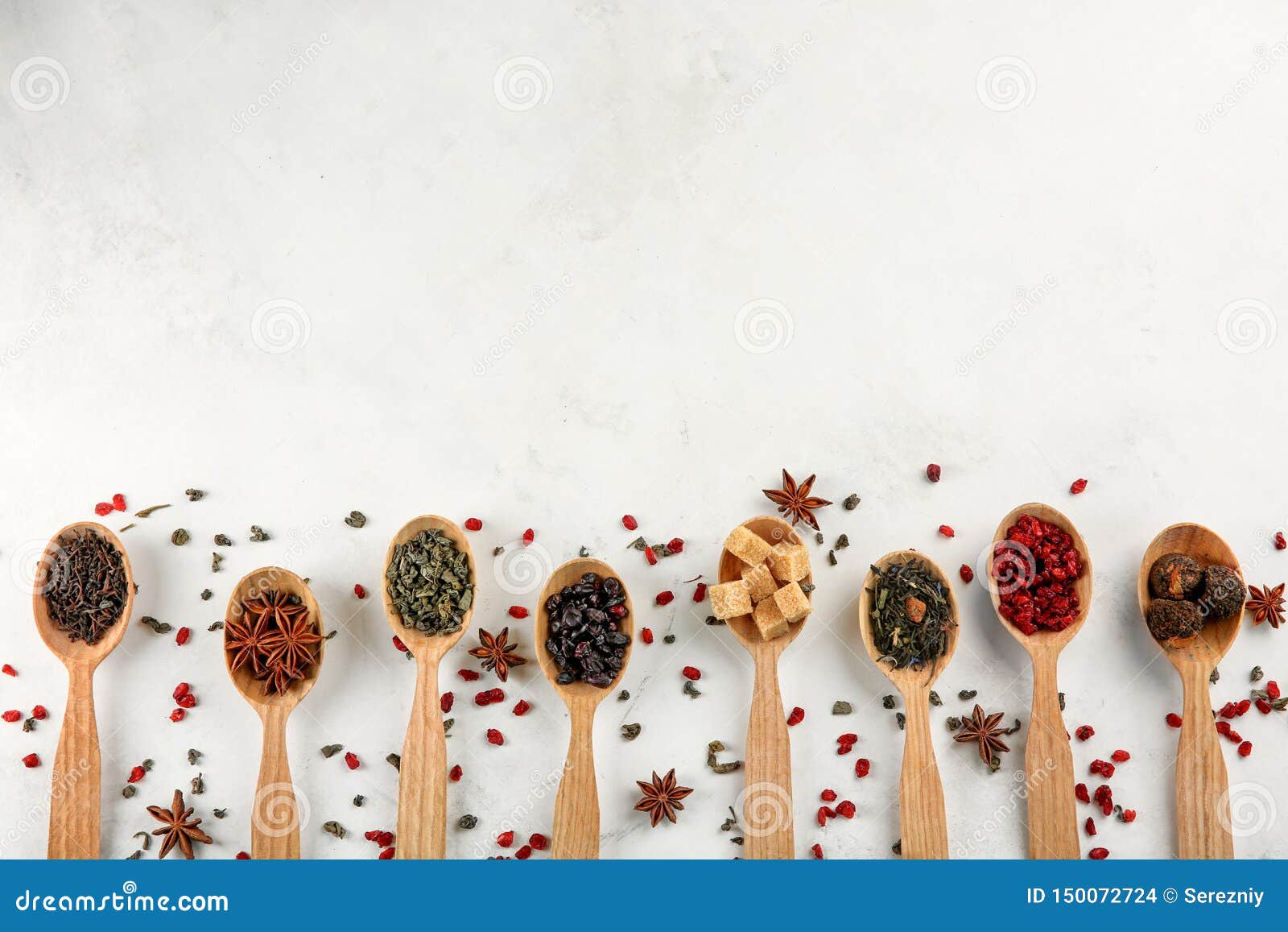 Spoons with Different Types of Tea on Light Background Stock Photo ...