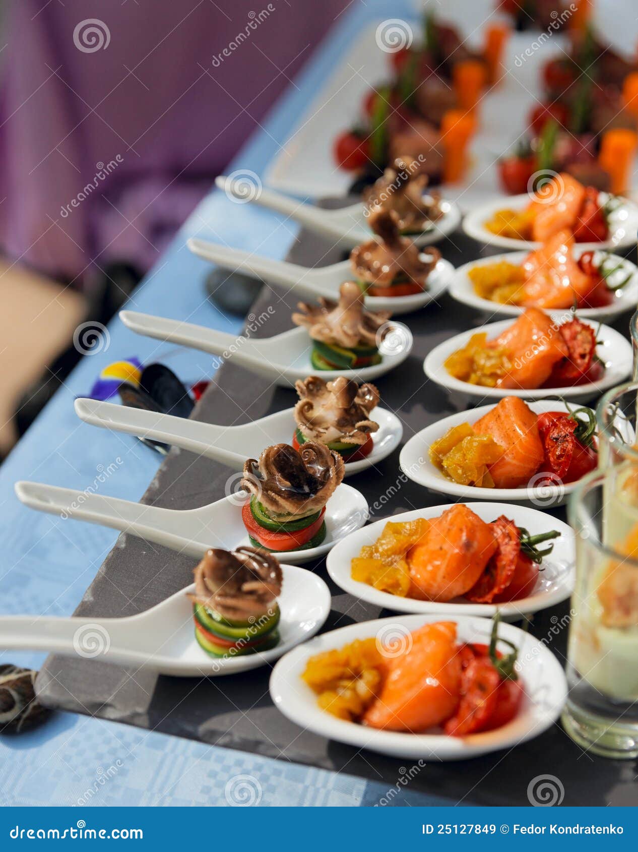 Spoons with seafood snacks stock image. Image of service - 25127849