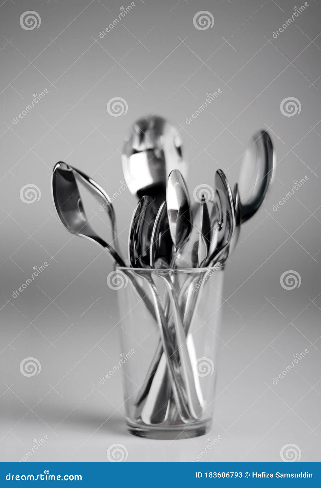 Spoons Standing in a Container Stock Image - Image of utensil, people ...