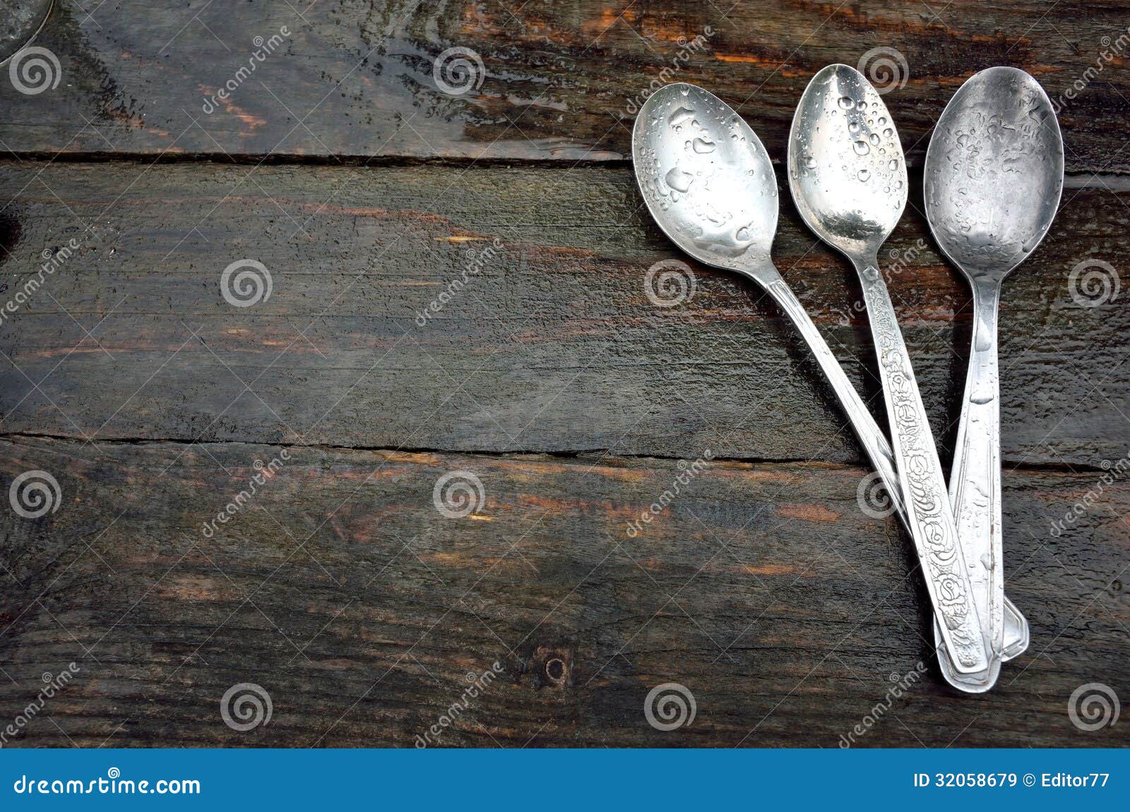 Spoons on the wooden table stock image. Image of shiny - 32058679