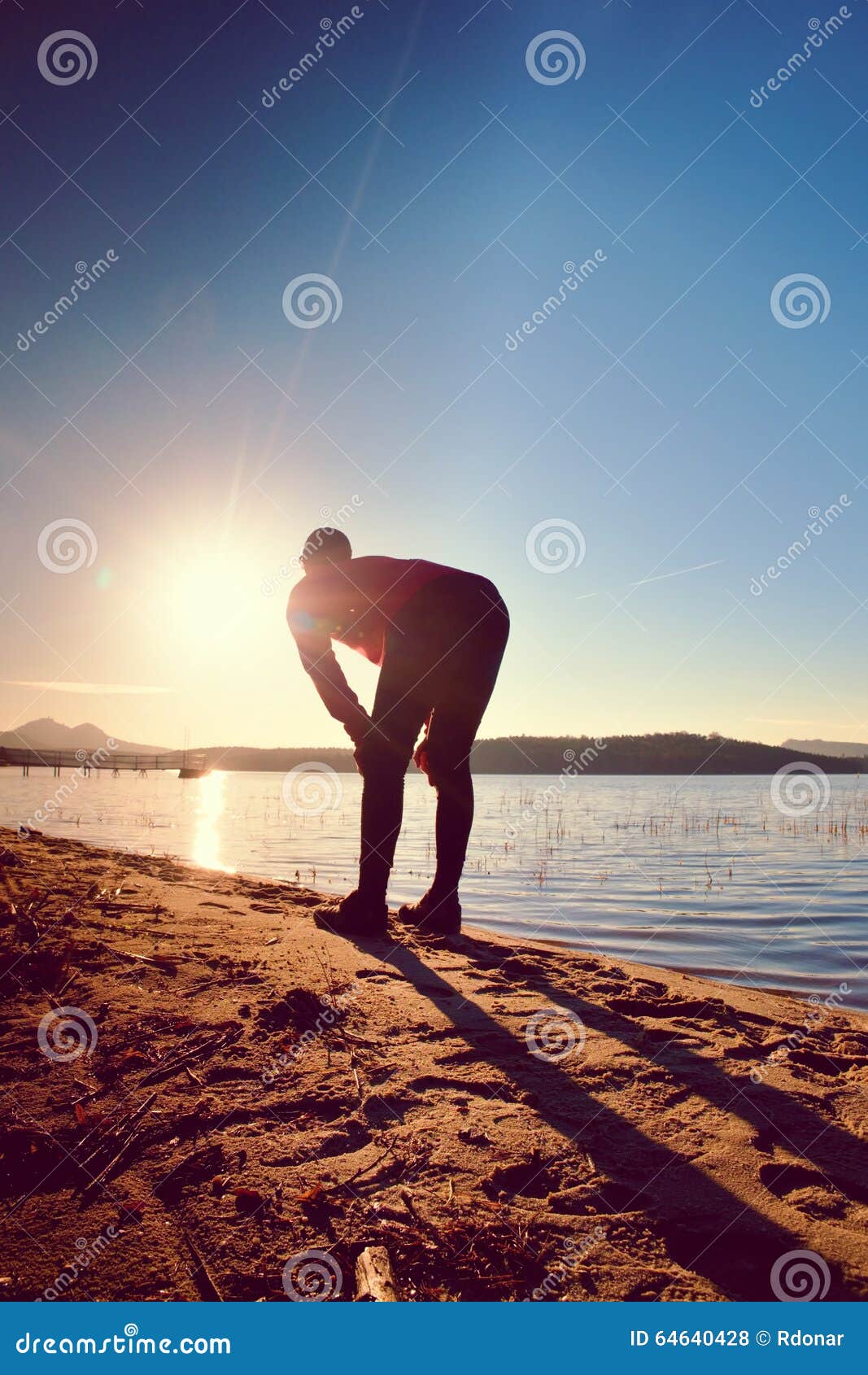 Sport Active Man Running and Exercising on the Beach at Sunset. Stock ...