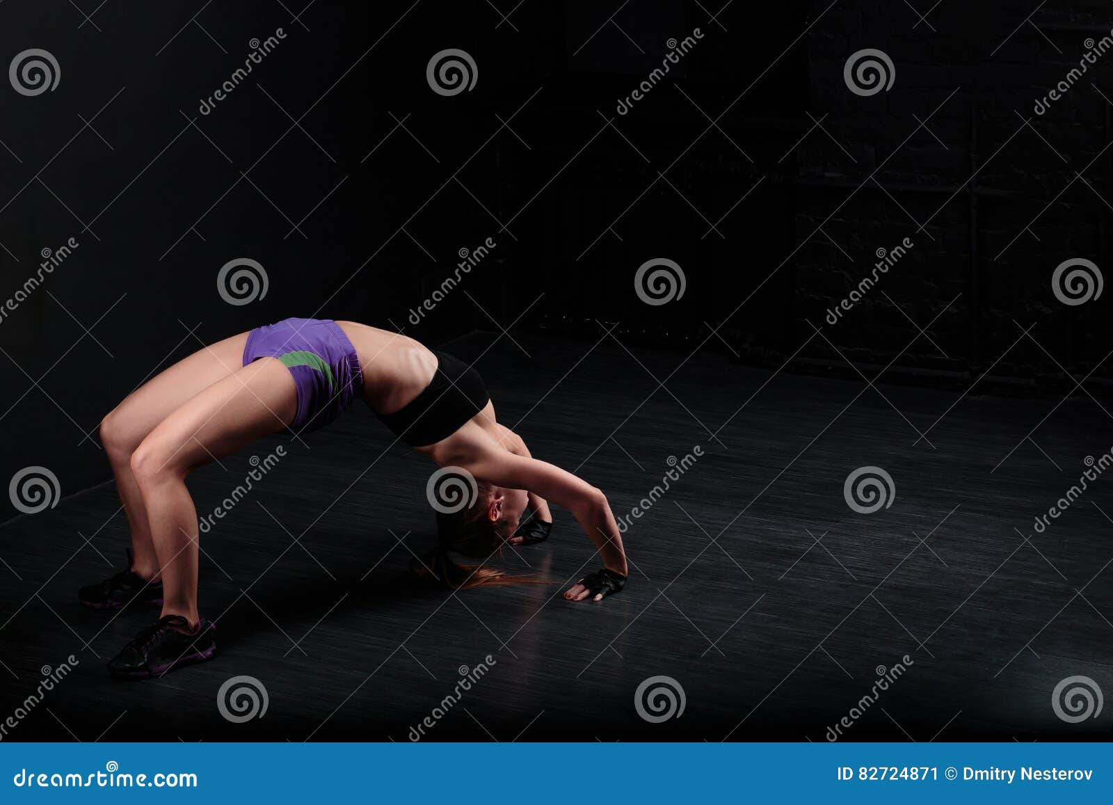 Sport Girl Doing Exercise on a Black Background. Stock Image - Image of ...