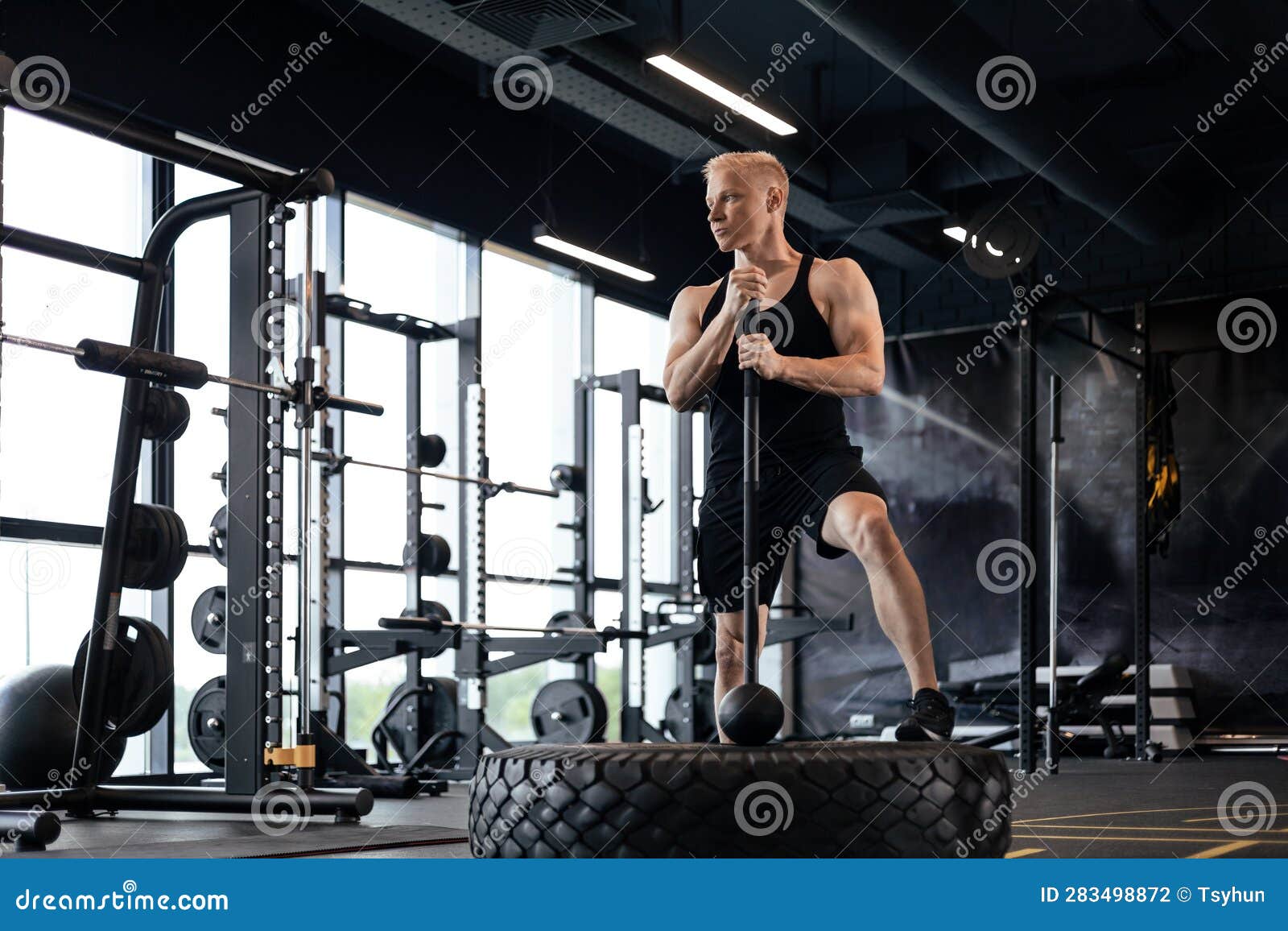 Sport Training for Endurance, Strong Man with Hammer. Concept of ...