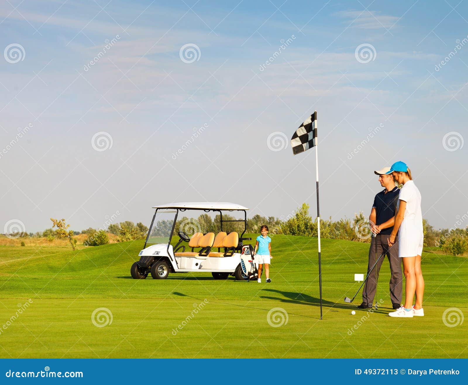 Sportive Family Playing Golf on a Golf Course Stock Image - Image of ...