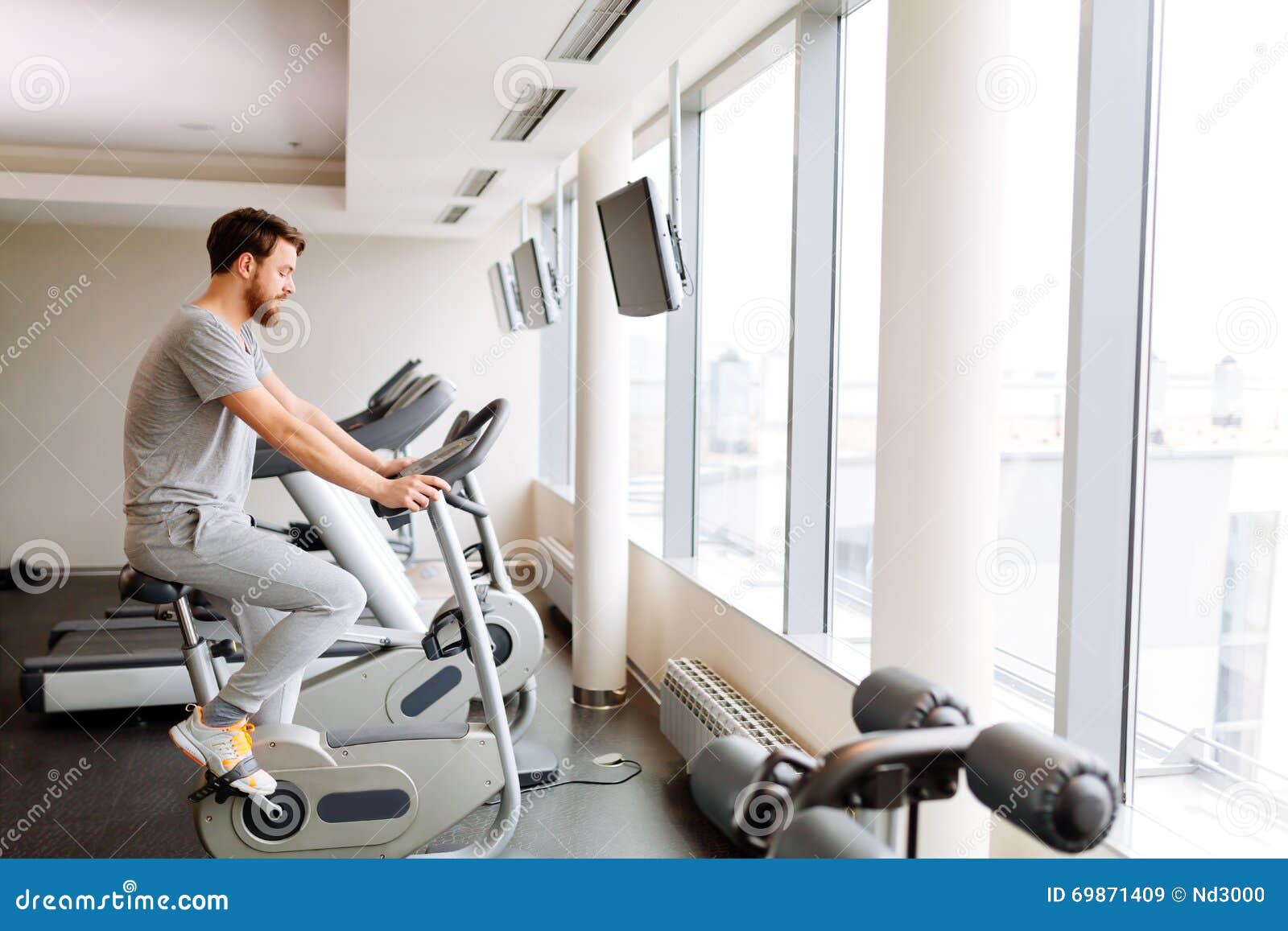 Sportive Male Exercising on Bicycle Stock Image - Image of club ...