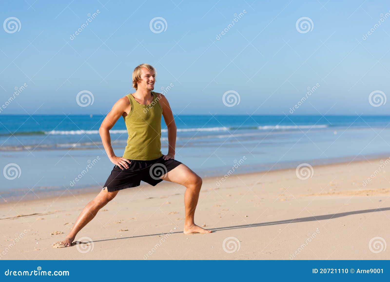 Sportive Man Doing Gymnastics on the Beach Stock Photo - Image of ...
