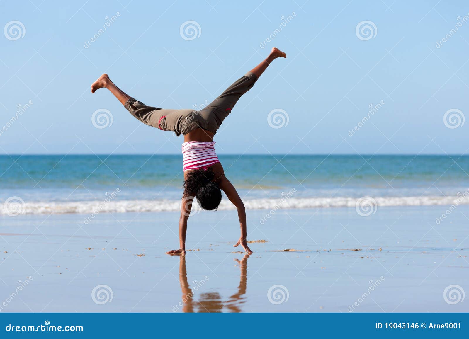 Sportive Woman Doing Gymnastics on the Beach Stock Photo - Image of ...