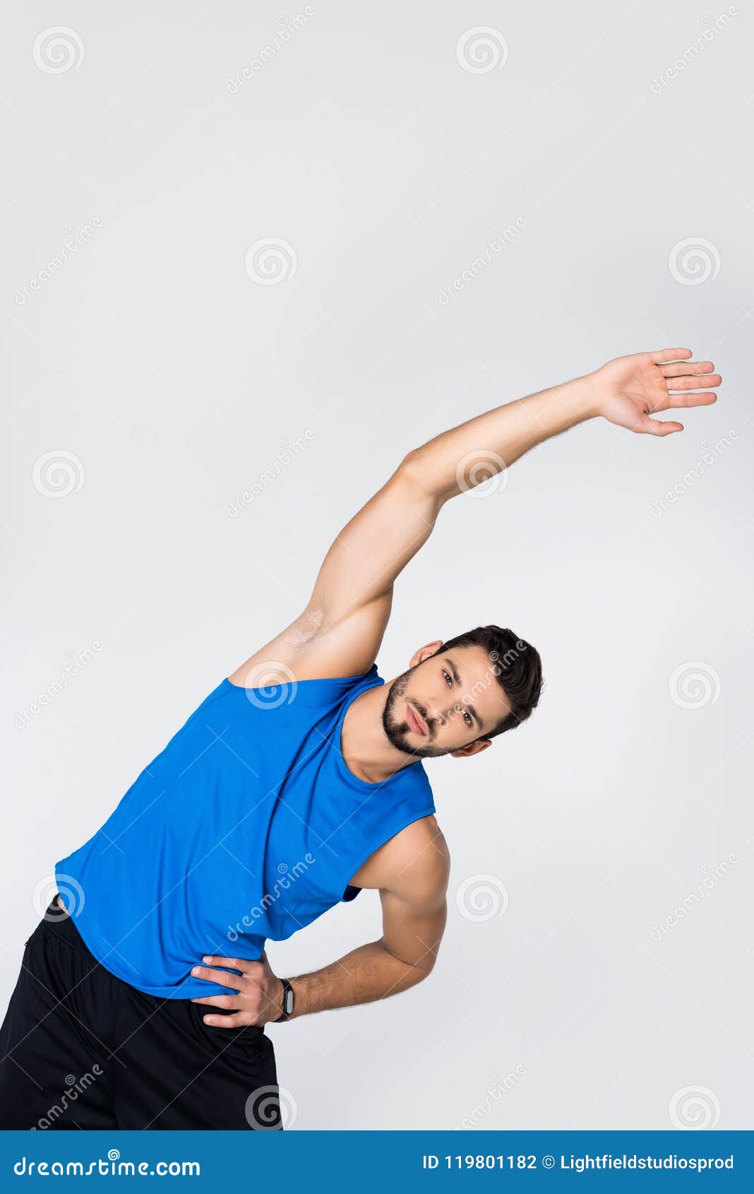 Sportive Young Man Doing Side Bend Stock Photo - Image of white ...