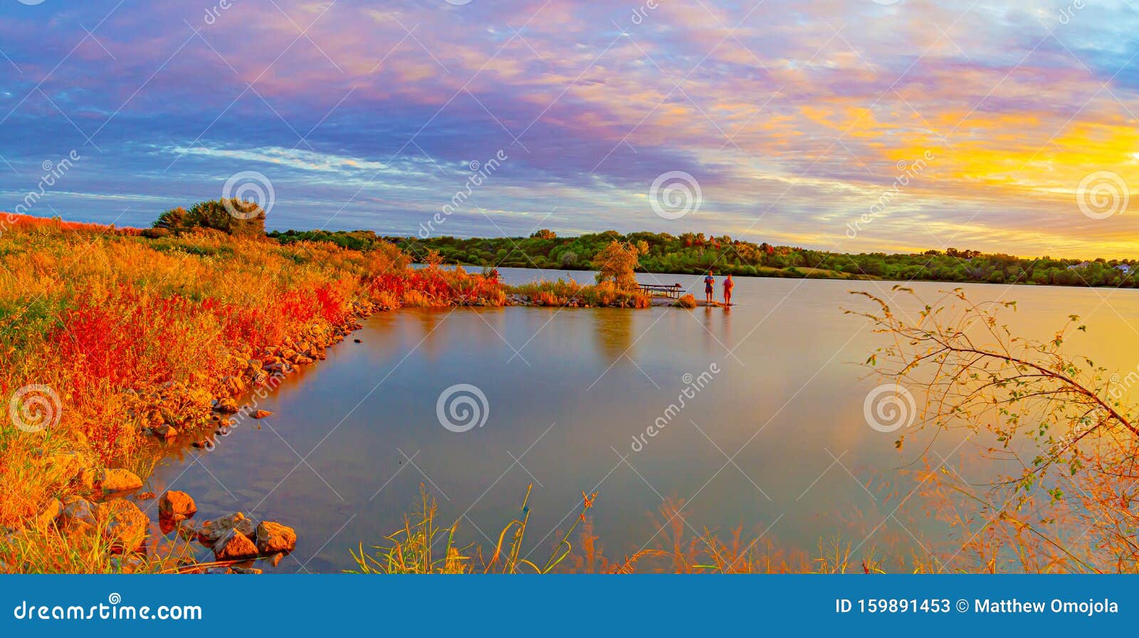 Sports Fishermen at Sunset Early Fall with Beautiful Skyline Over Ed ... Sports Fishermen at Sunset Early Fall with Beautiful Skyline Over Ed ...
