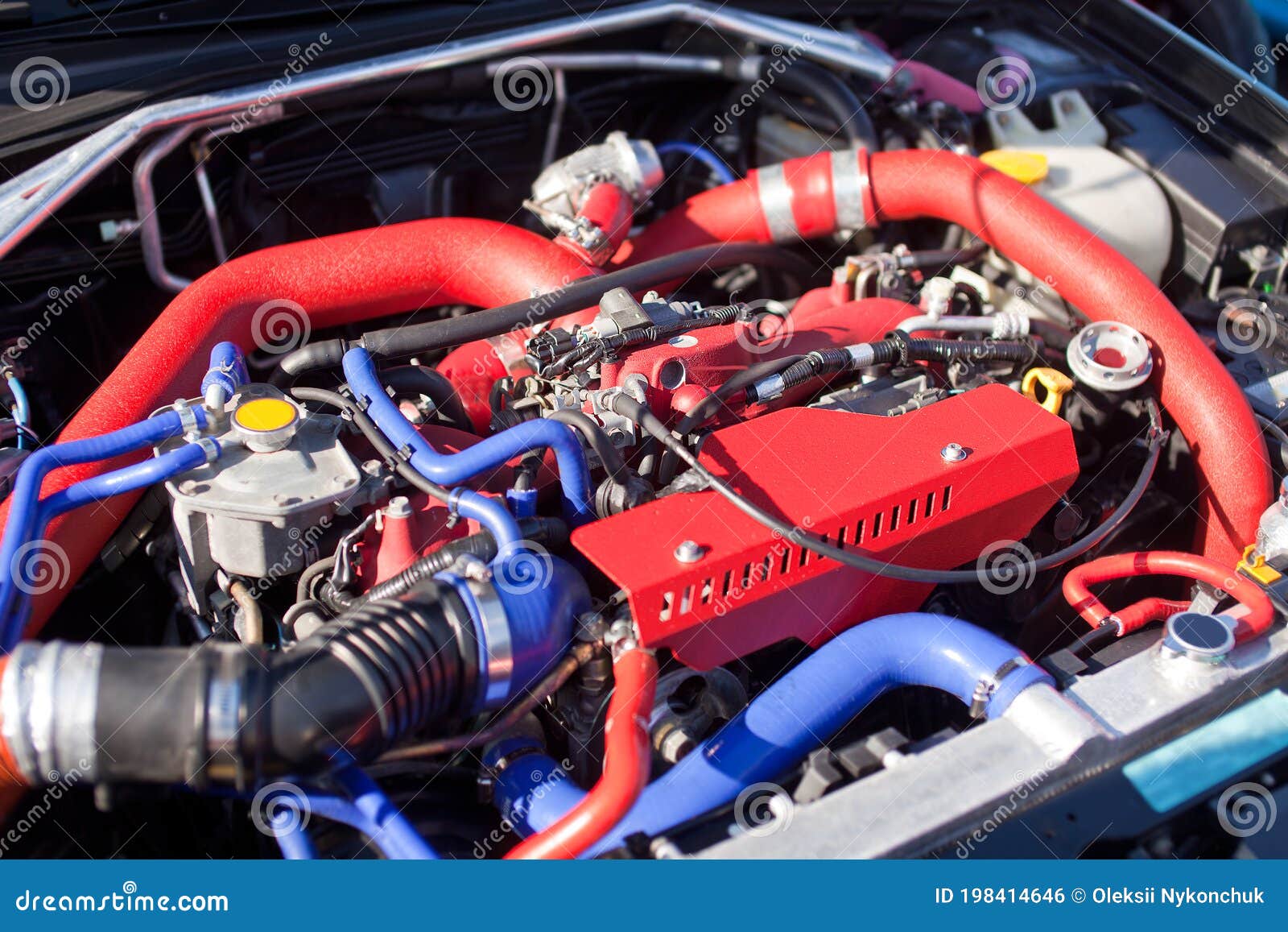 Sports Motor with Red Intake Elements Close Up on a Sports Car Stock ...