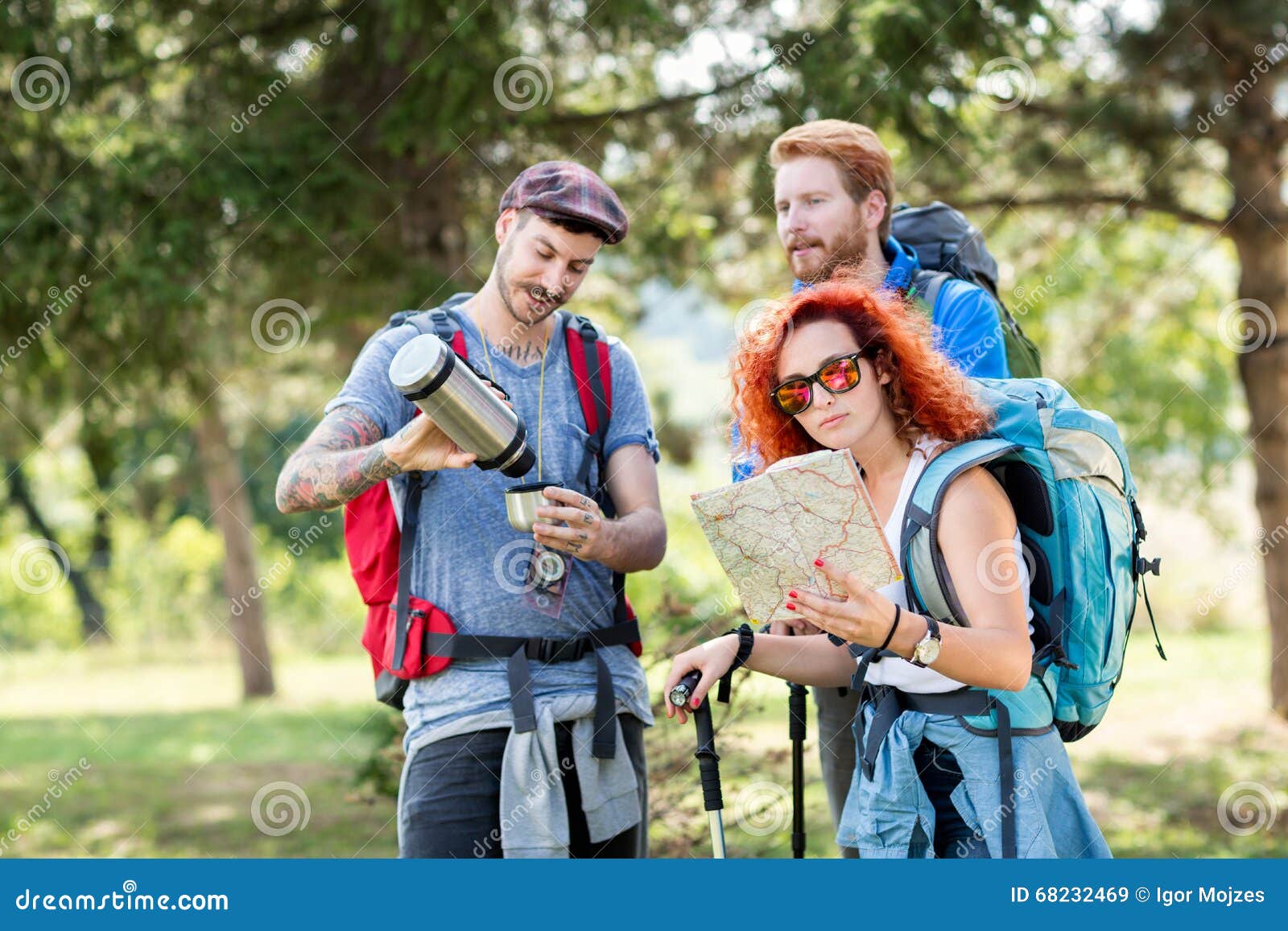 Sports People with Backpack in Forest with Hiking Sticks Stock Image ...