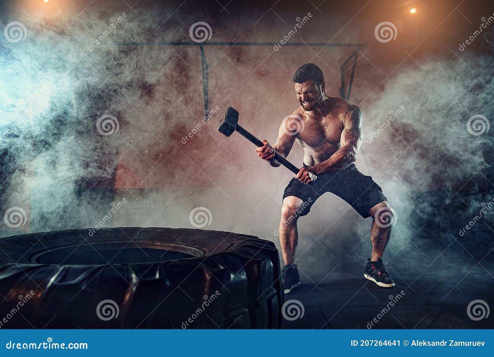 Sports Training for Endurance, Man Hits Hammer. Concept Workout Stock ...