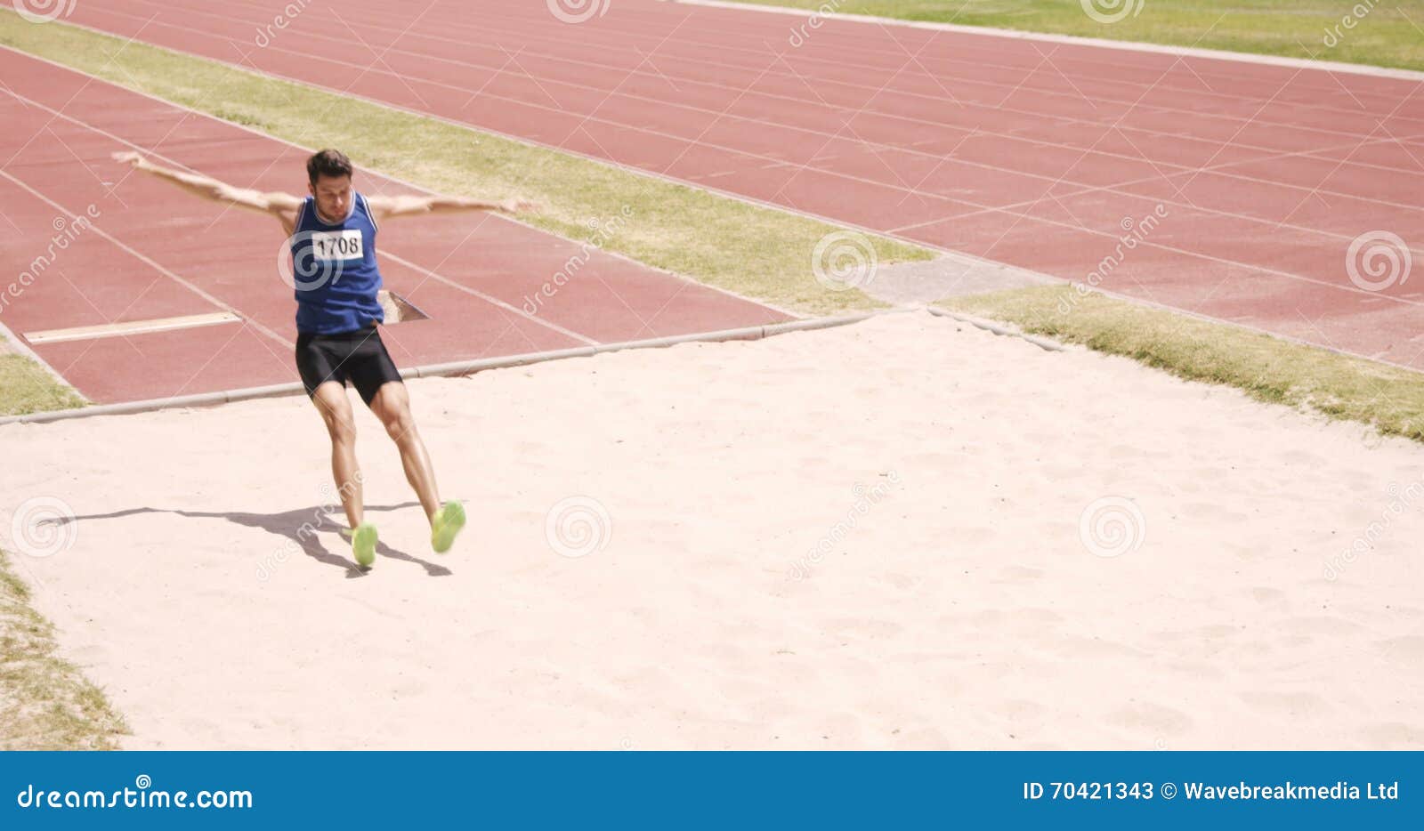 Sportsman doing long jump stock video. Video of healthy - 70421343