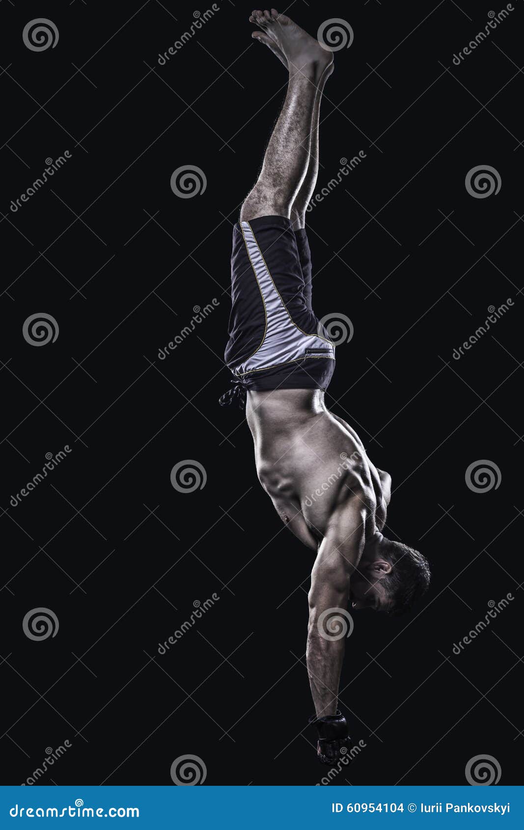 Sportsman Performs One Hand Stand Photos - Free & Royalty-Free Stock ...