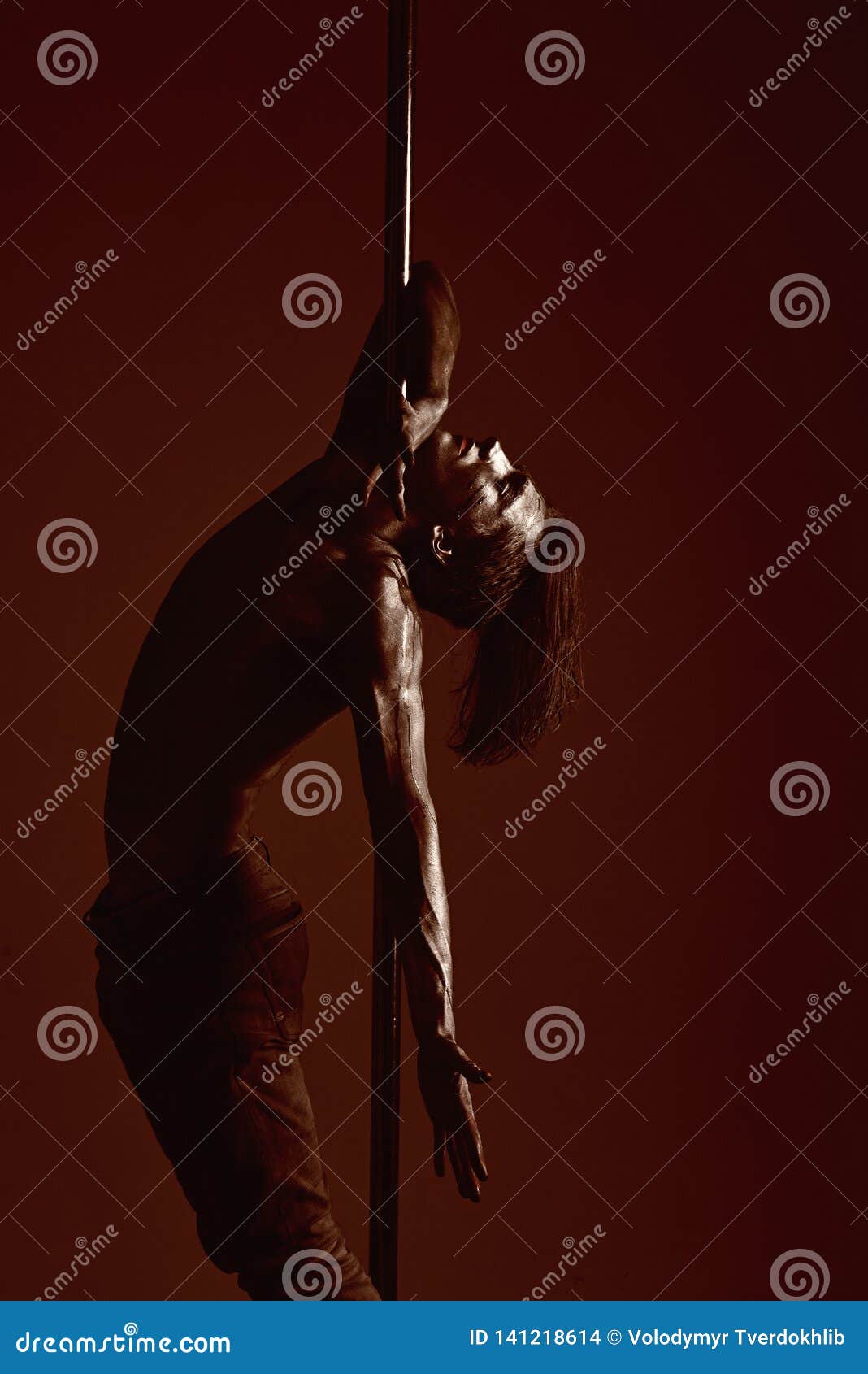 Sportsman on Pylon, Sportsman Dancing on Pole with Silver Body. Stock ...