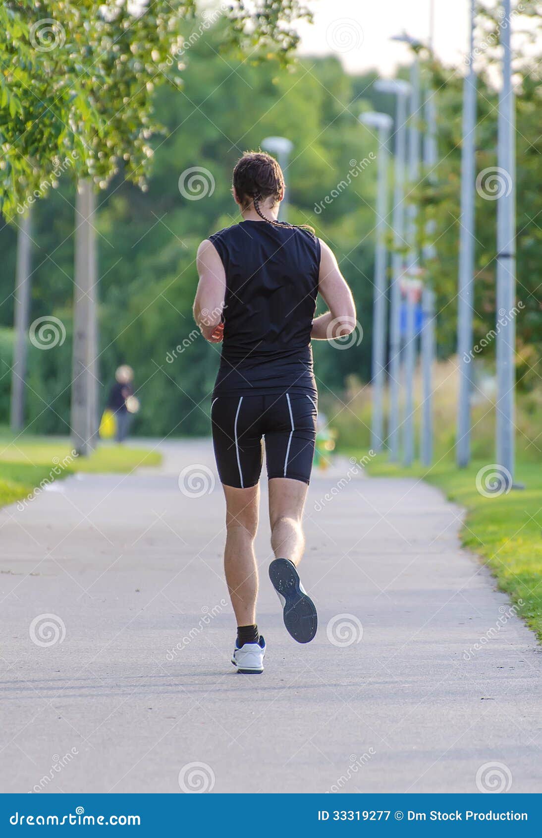 Sportsman running in park. stock image. Image of leisure - 33319277