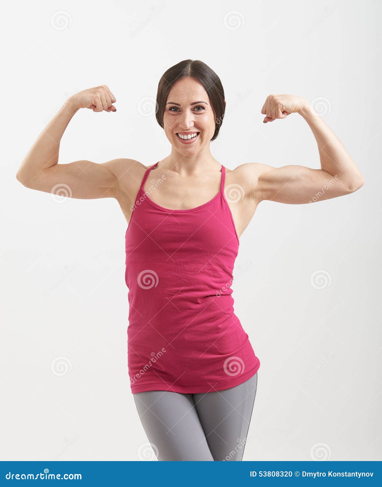 Sportswoman Showing Two Biceps Stock Photo - Image of biceps, woman ...
