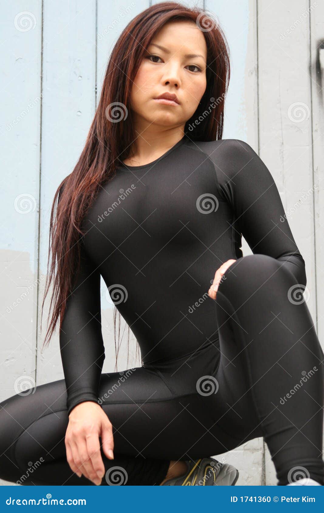 Sporty Asian Girl Crouching Stock Photo - Image: 1741360