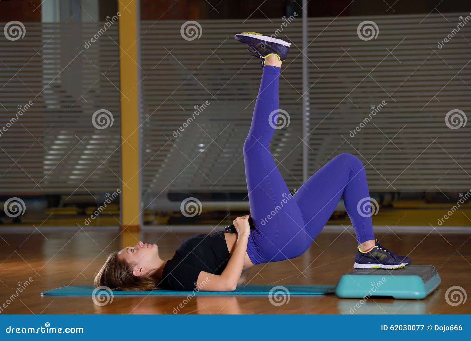 Sporty Girl Doing Exercise on Platform for an Aerobics Step Stock Image ...